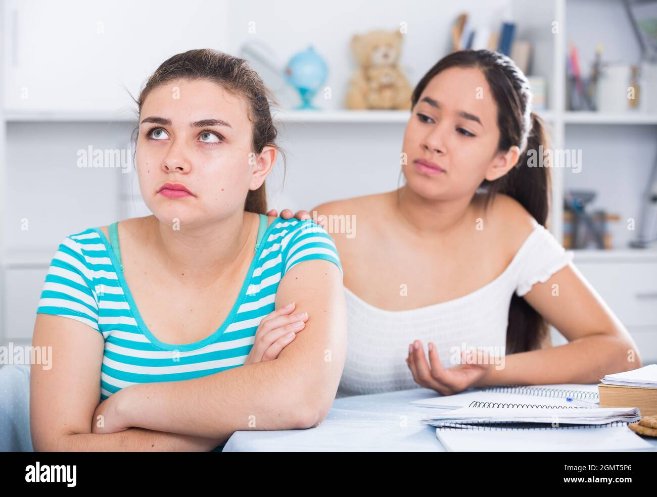 Girls asking friend hi-res stock photography and images - Alamy