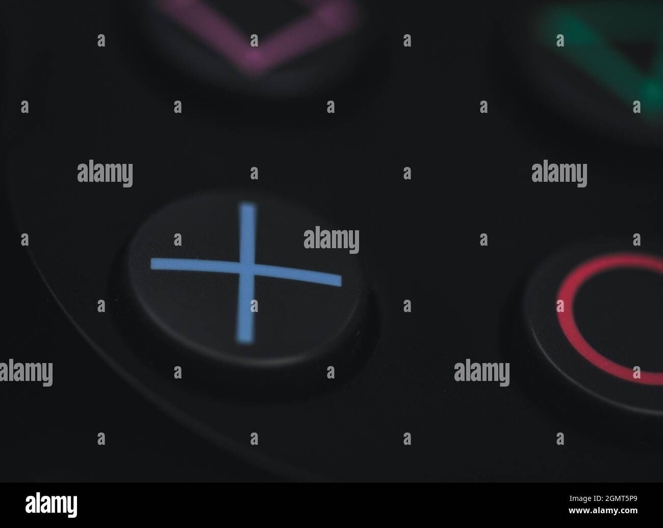 Closeup shot of an x button on a game controller Stock Photo - Alamy