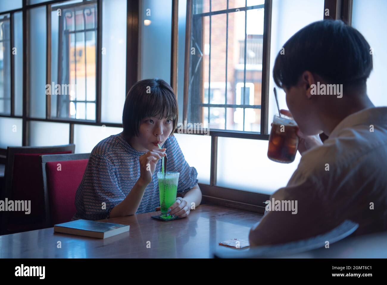 Couple in Japanese style Cafe Stock Photo - Alamy