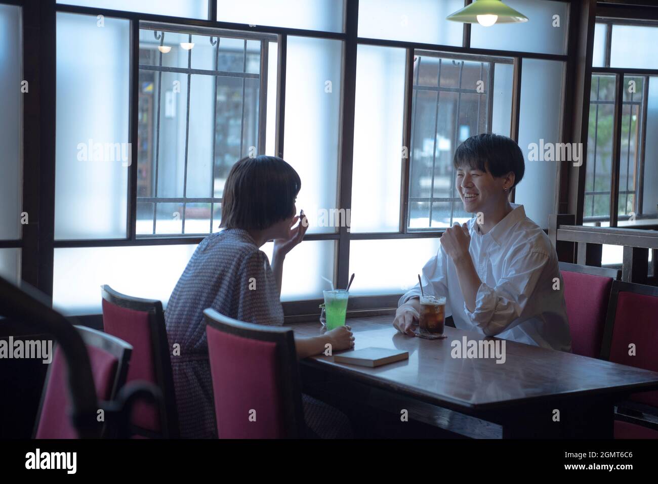 Couple in Japanese style Cafe Stock Photo - Alamy