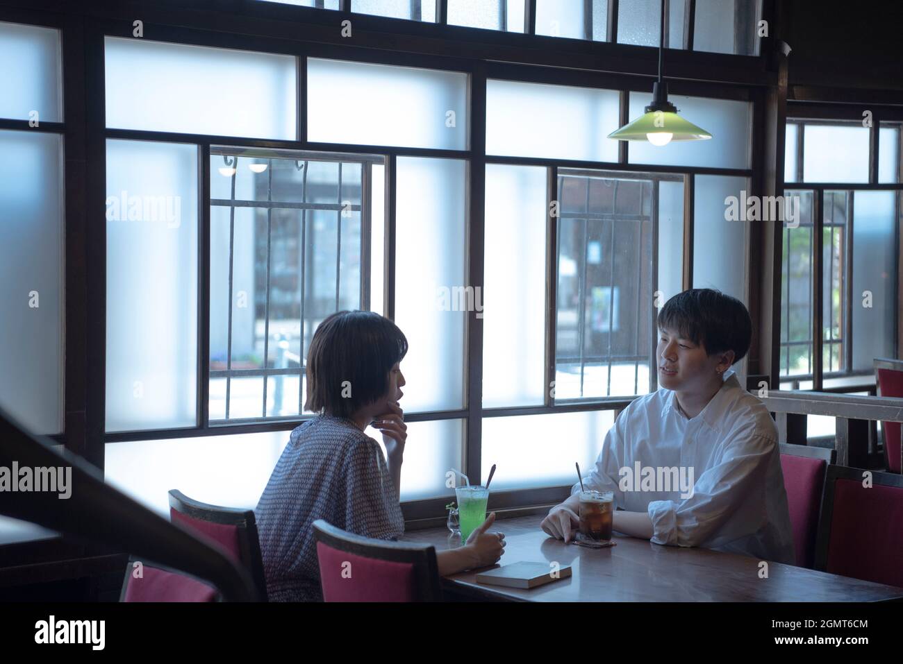 Couple in Japanese style Cafe Stock Photo - Alamy