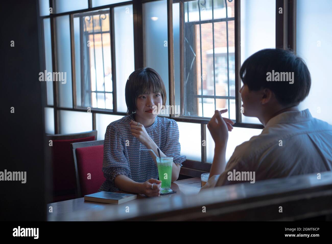 Couple in Japanese style Cafe Stock Photo - Alamy