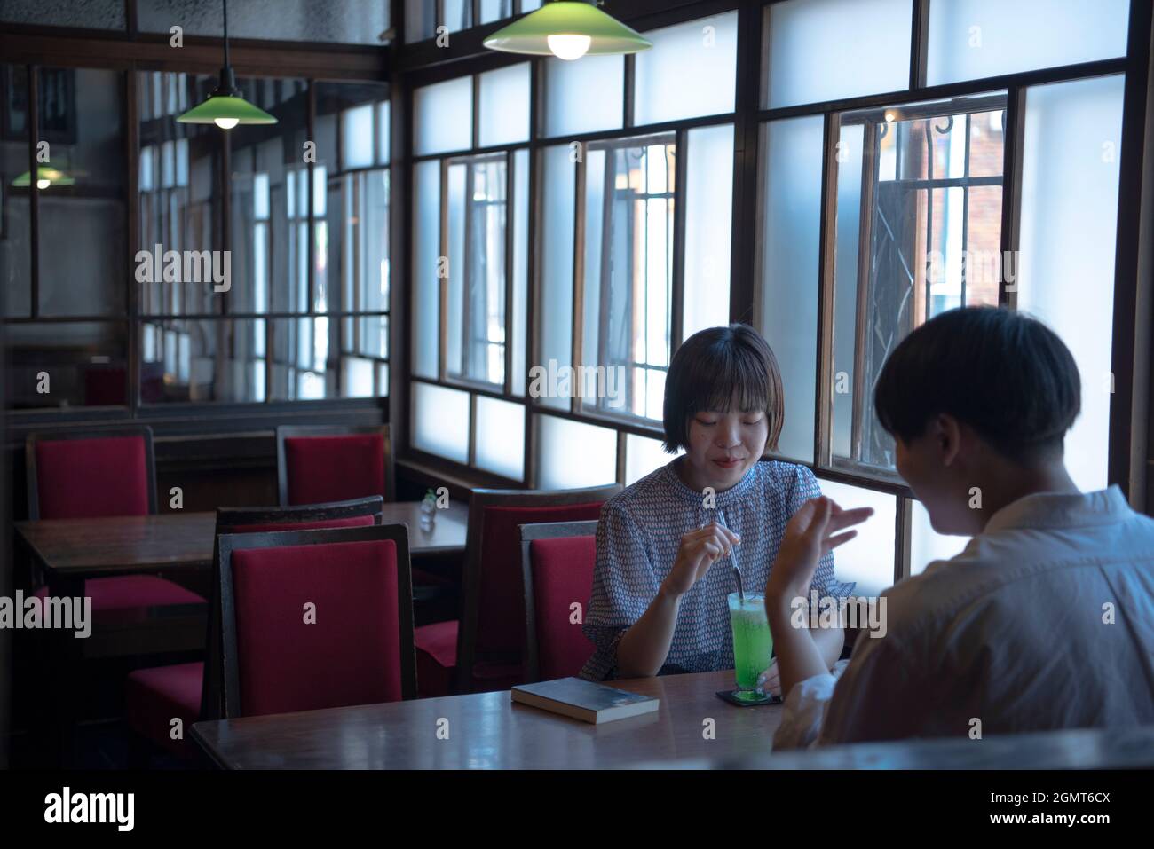 Couple in Japanese style Cafe Stock Photo - Alamy