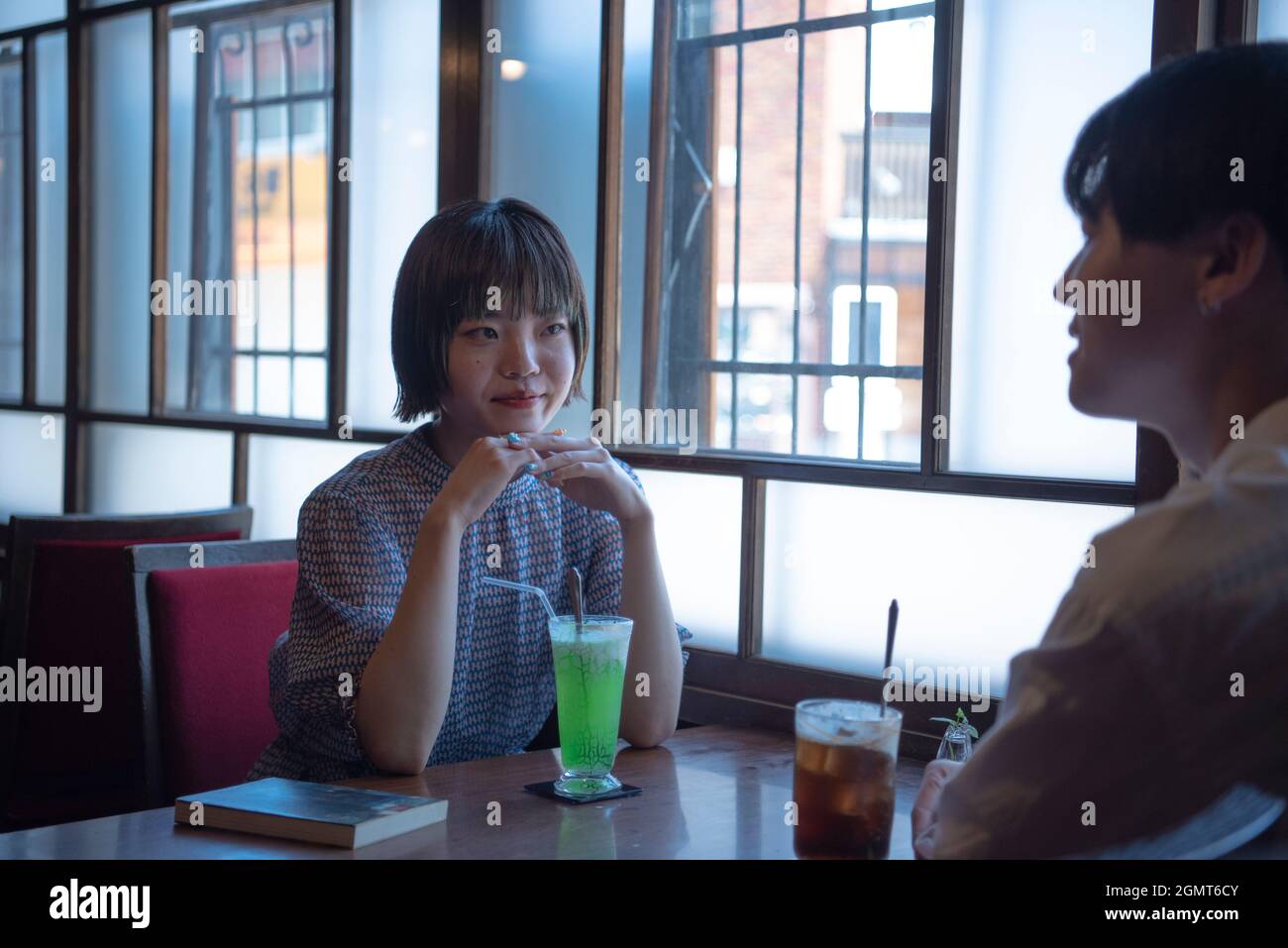 Couple in Japanese style Cafe Stock Photo - Alamy