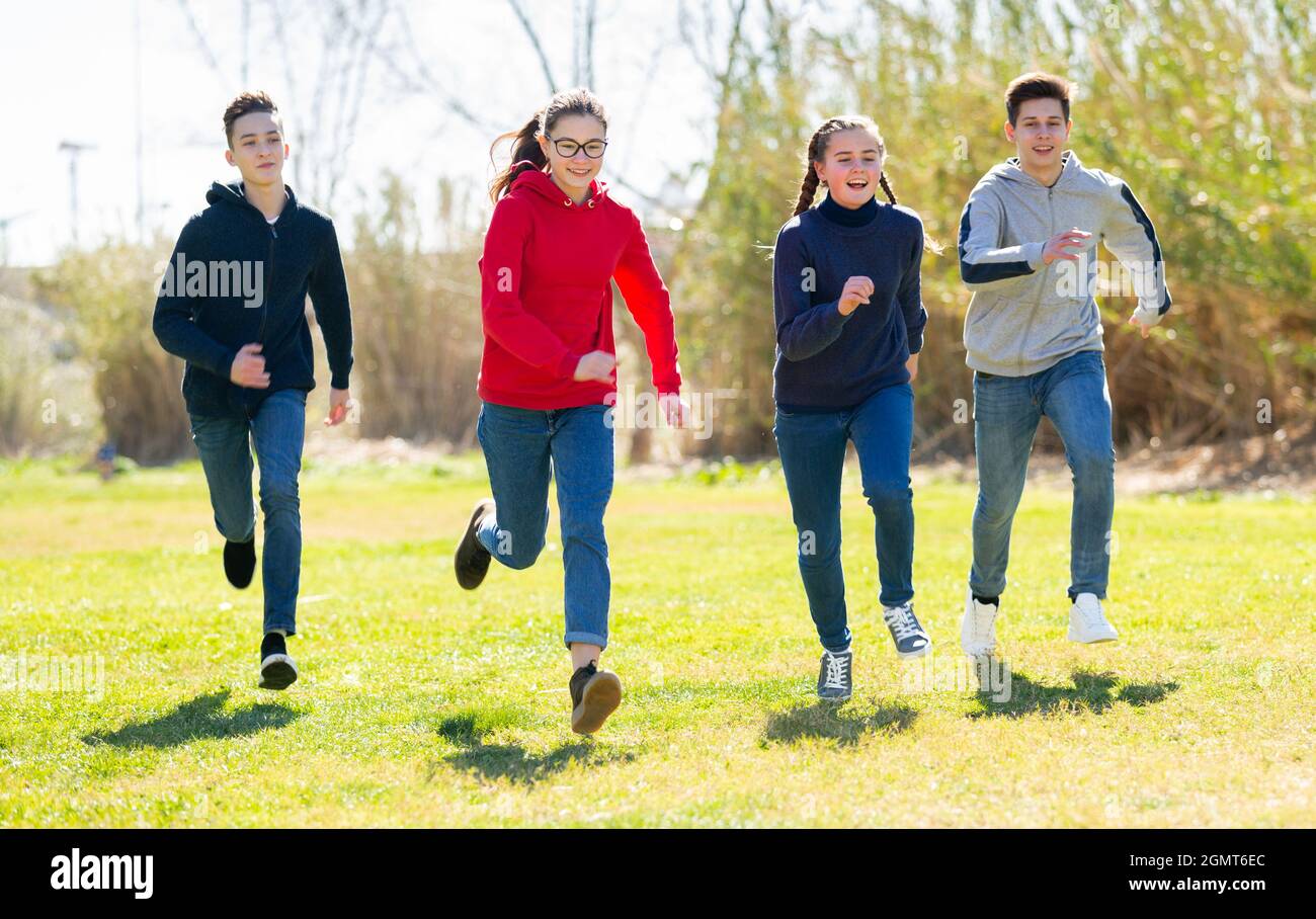 Boy chasing girl hi-res stock photography and images - Alamy