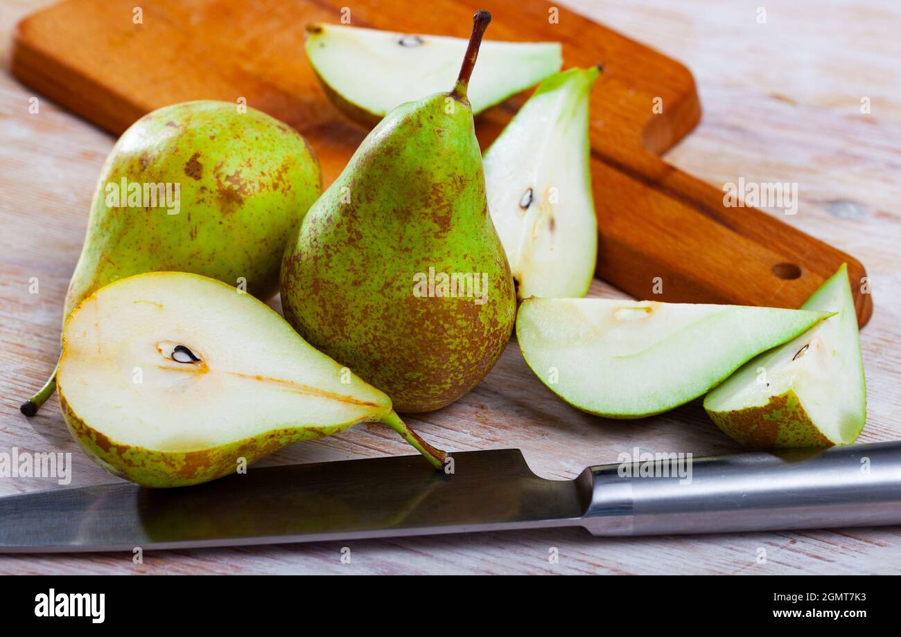 Whole and sliced pears Stock Photo - Alamy