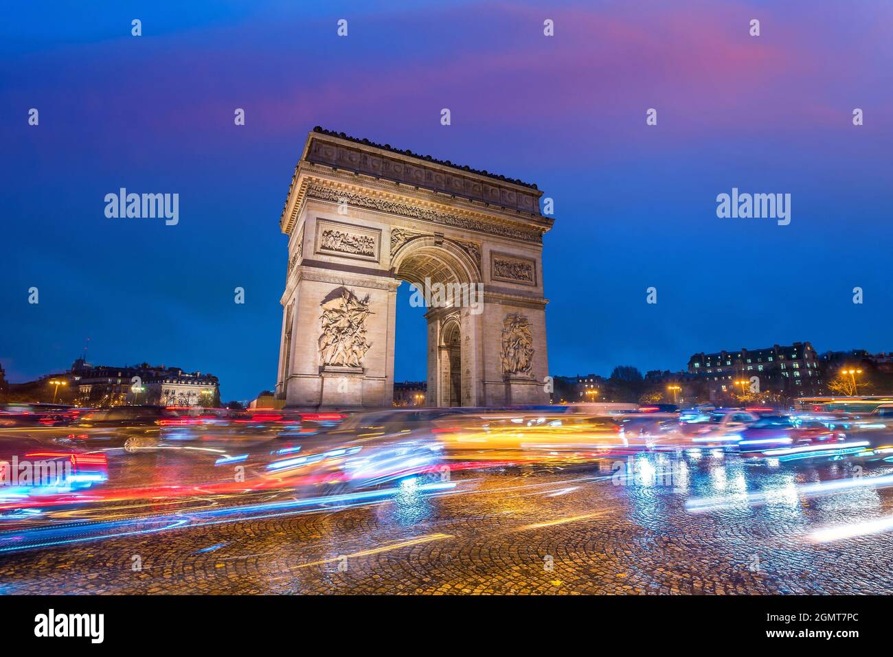 Famous Arc de Triomphe at twilight in Paris, France Stock Photo - Alamy