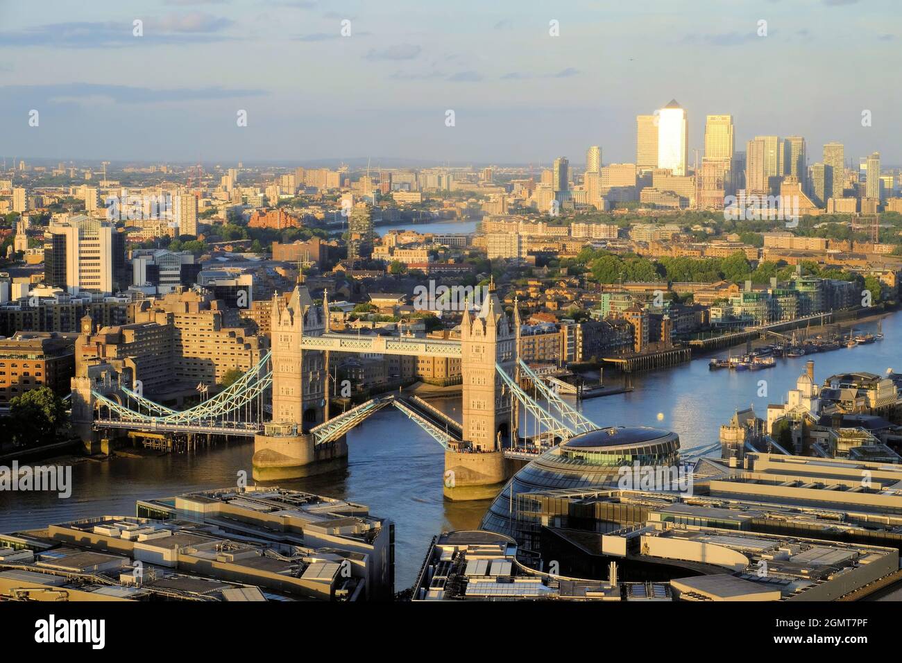 Elevated view downstream along the Thames to Isle of Dogs with open ...