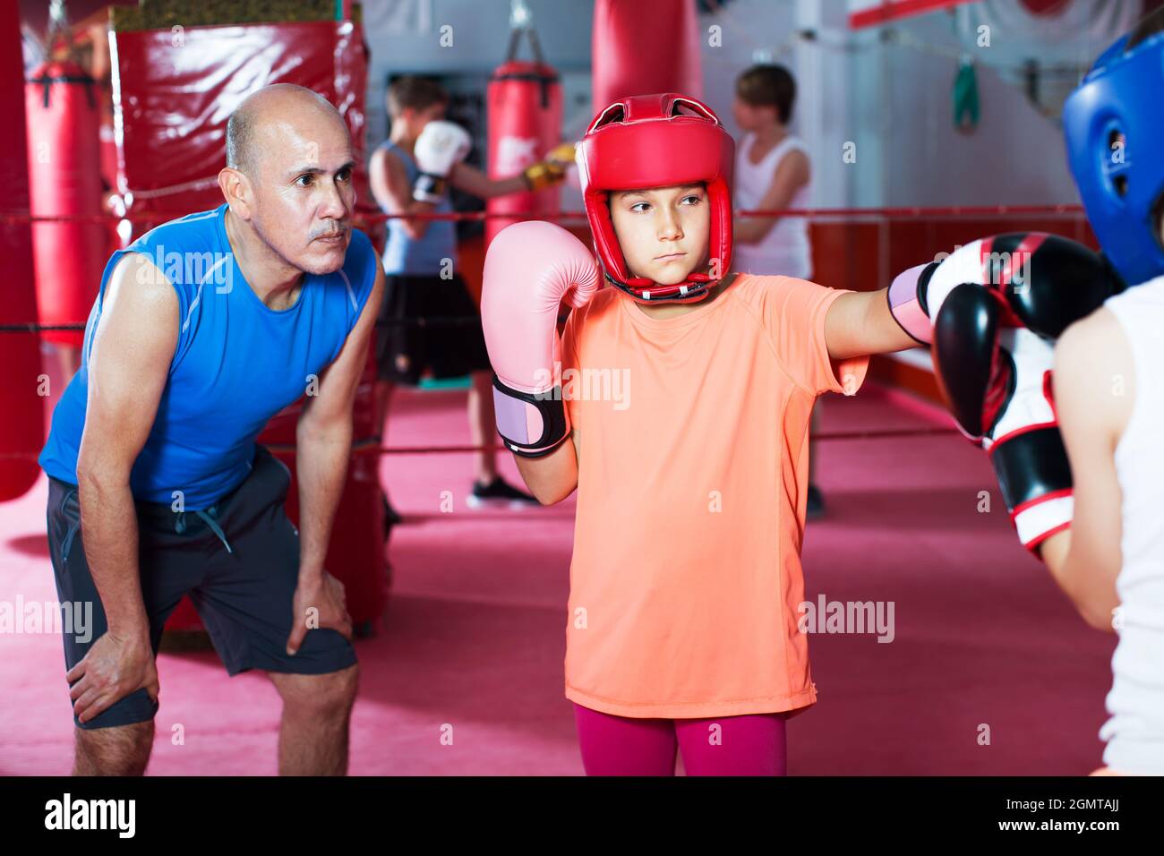 Children training on boxing ring Stock Photo - Alamy