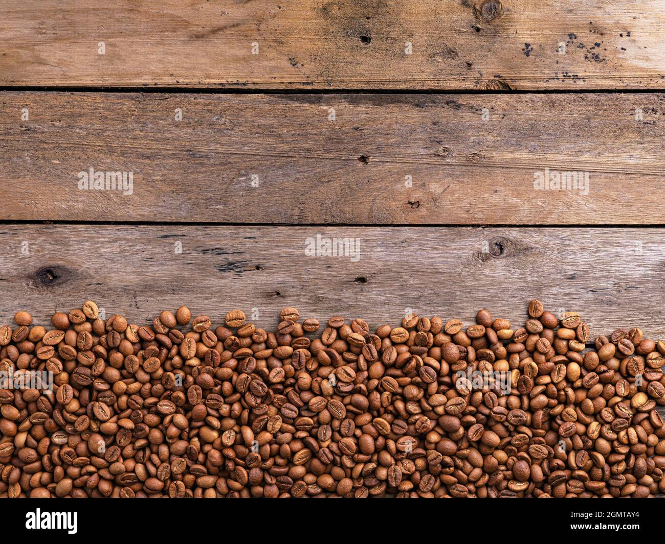 coffee beans on table top view Stock Photo - Alamy