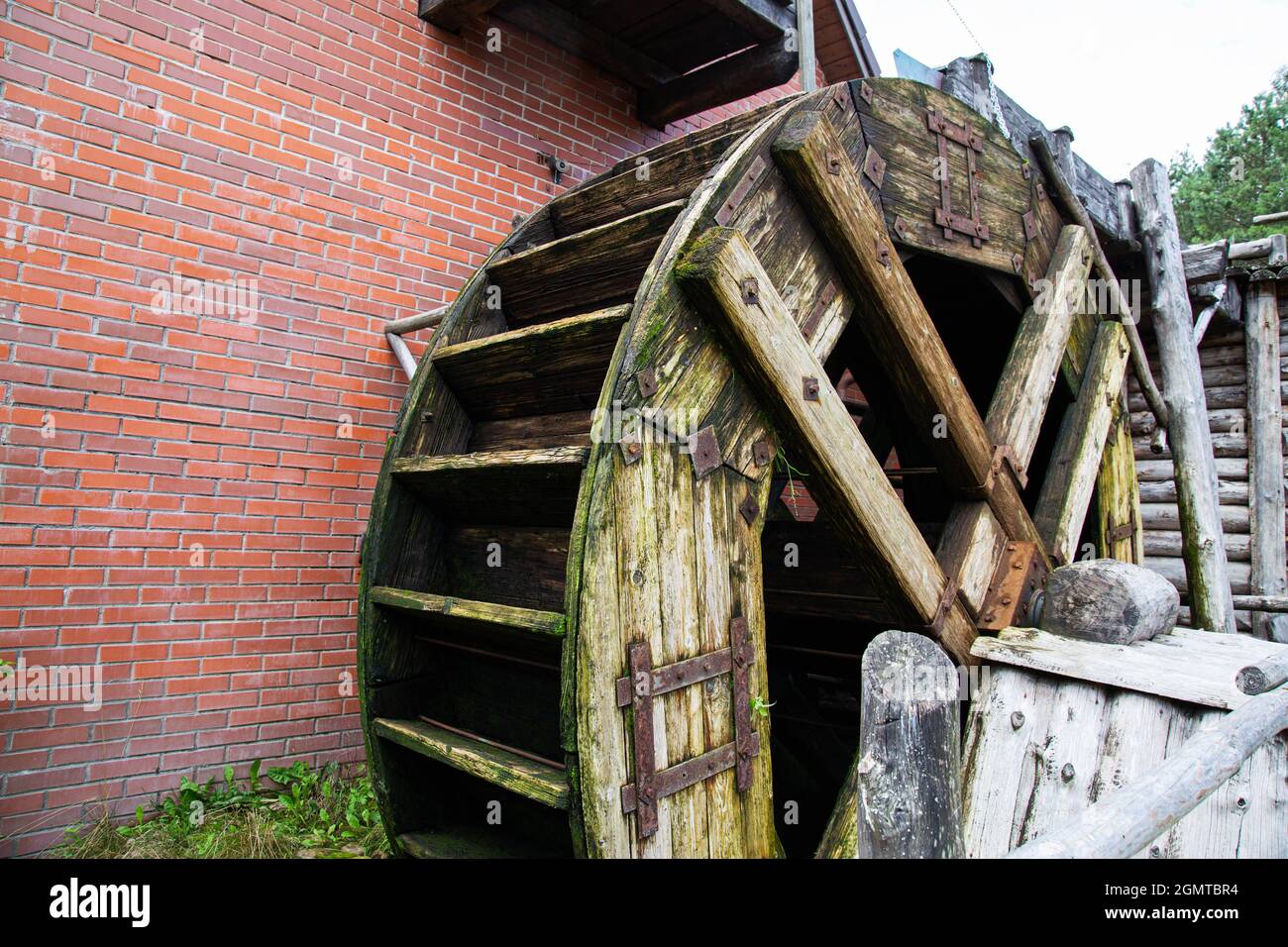 Old wooden water mill, antique style, background Stock Photo - Alamy