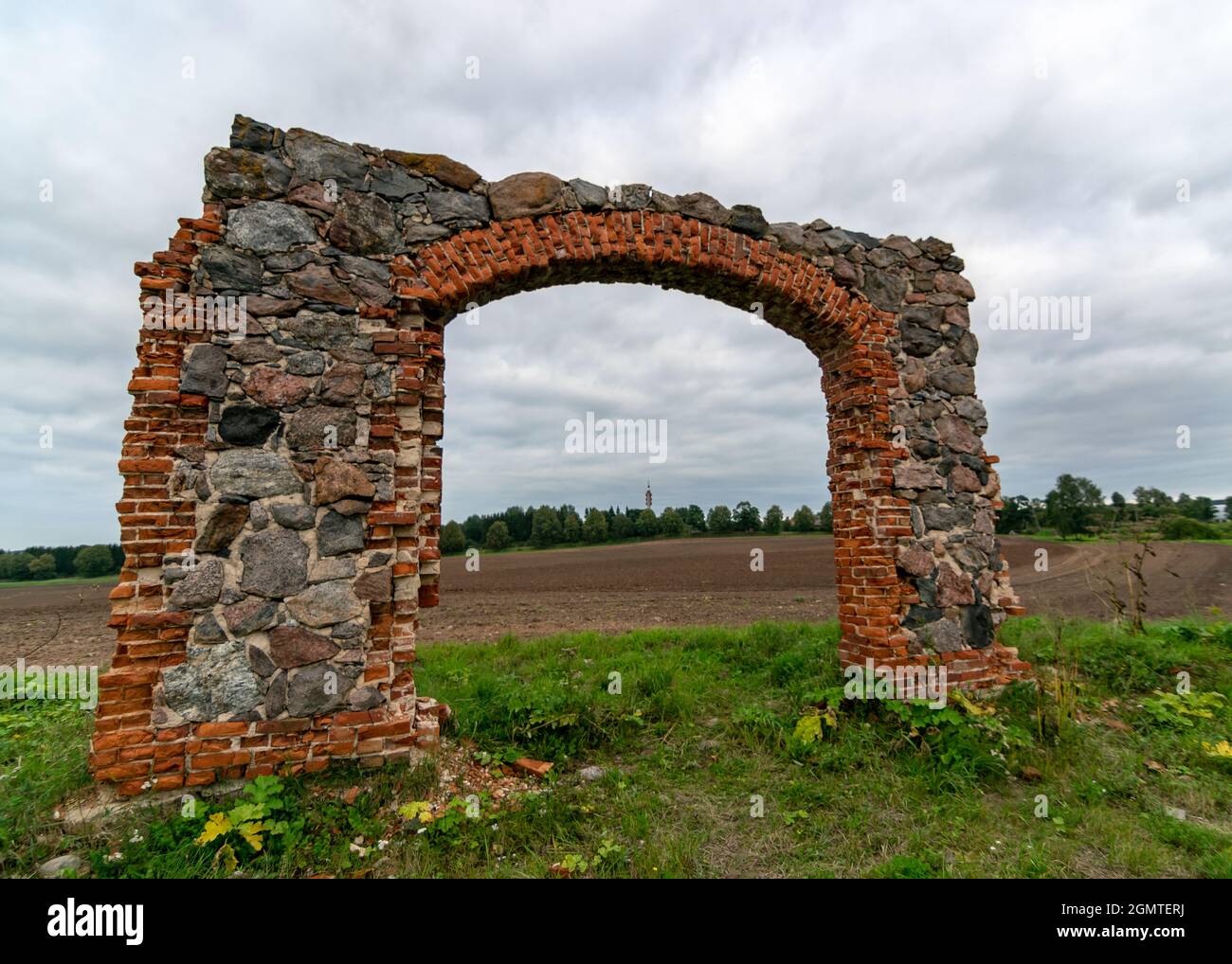 landscape with stone and brick barn ruins, old stone foundations ...