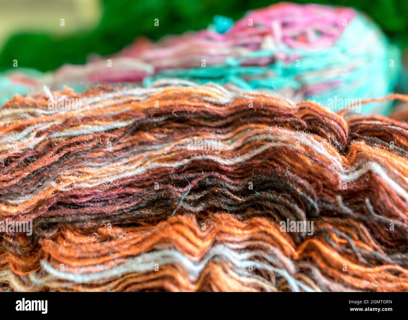 photography with colorful, variegated, bright wool yarn fragments ...
