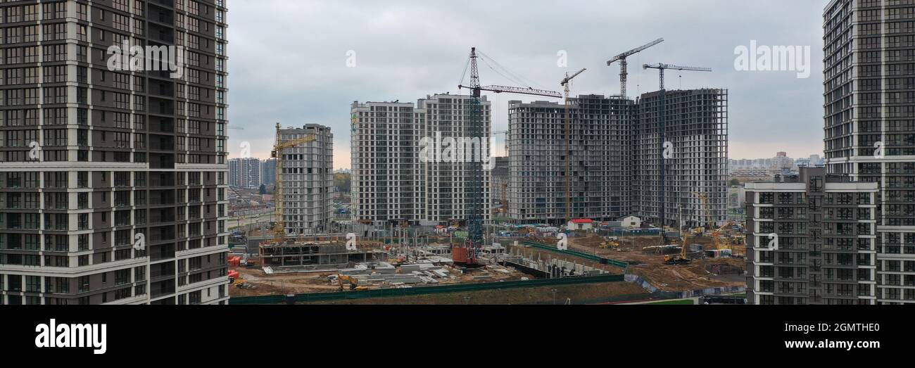 Construction of residential area in city closeup Stock Photo - Alamy