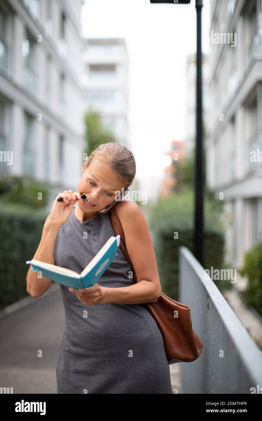 Busy personal assistant hi-res stock photography and images - Alamy