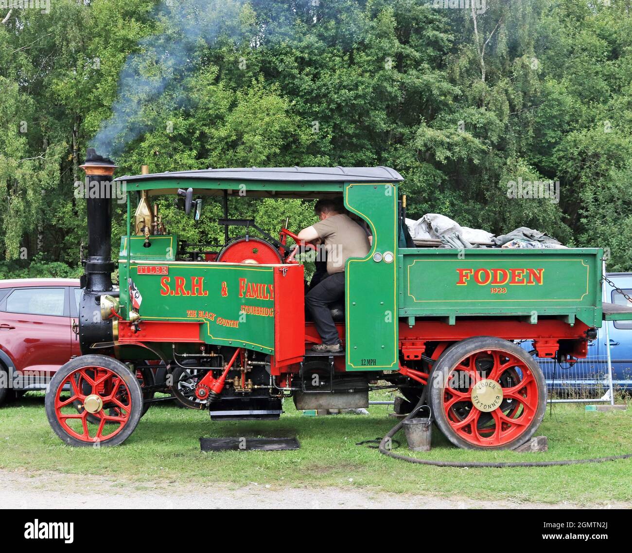 A persevered Foden steam tractor, sits quietly simmering away at the ...