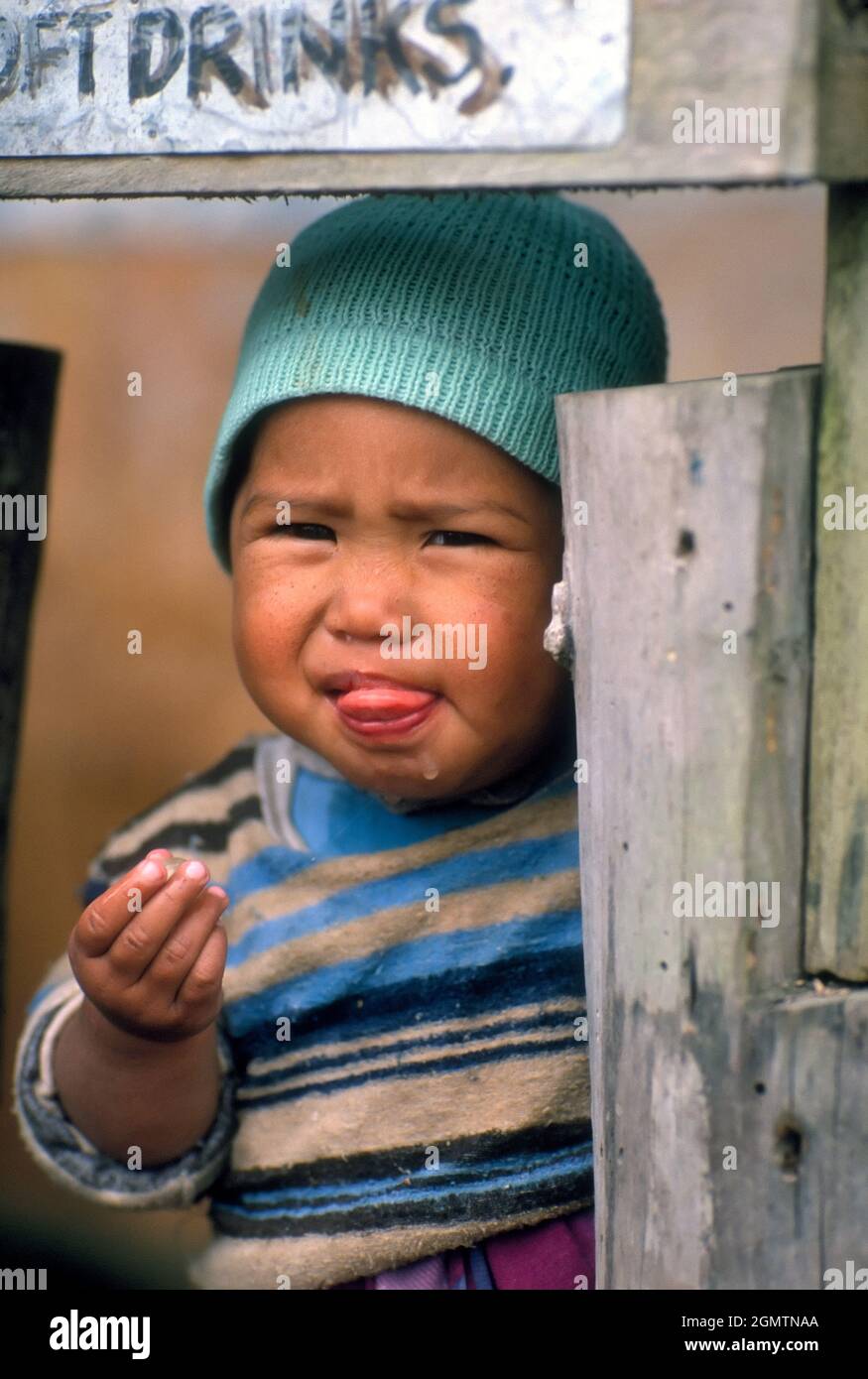 Banaue, Philippines - February 1986; this crying baby belongs to an ...