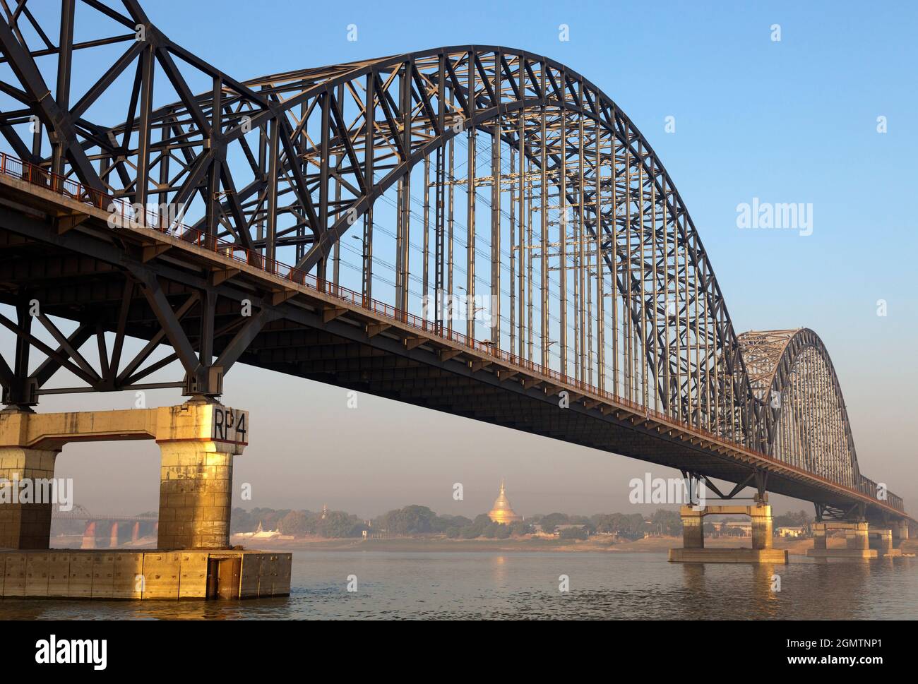 The Ayeyarwady Bridge in Myanmar crosses the Irrawaddy River, to the ...