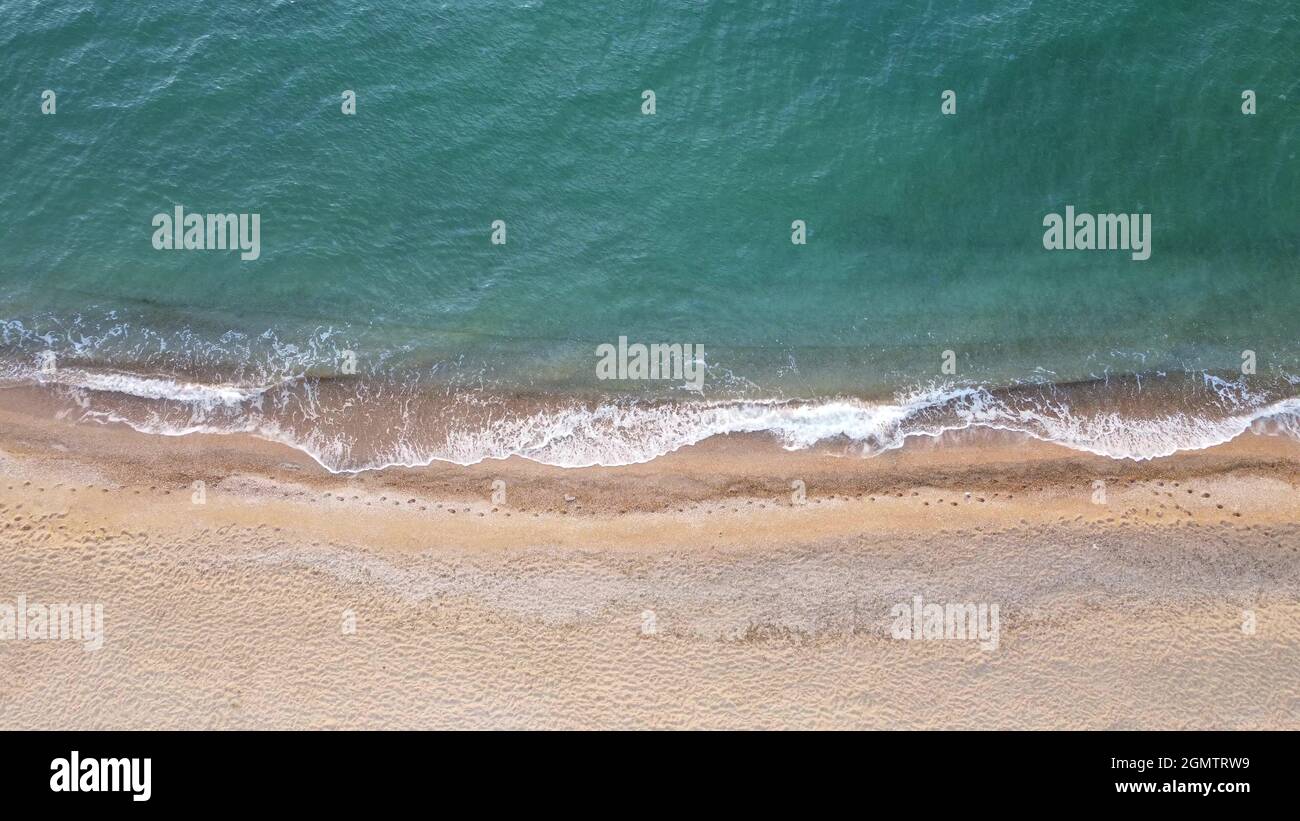 Top view of empty and clean beach and waves of blue sea with clear ...