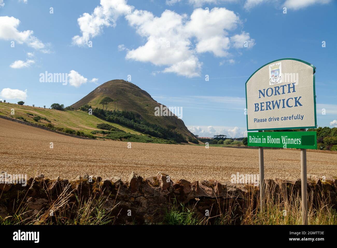 North Berwick Law behind a sign for North Berwick Stock Photo - Alamy