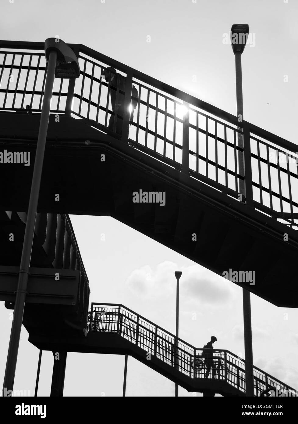 Radley Village, Oxfordshire, England - 1 July 2019; one man ascending ...