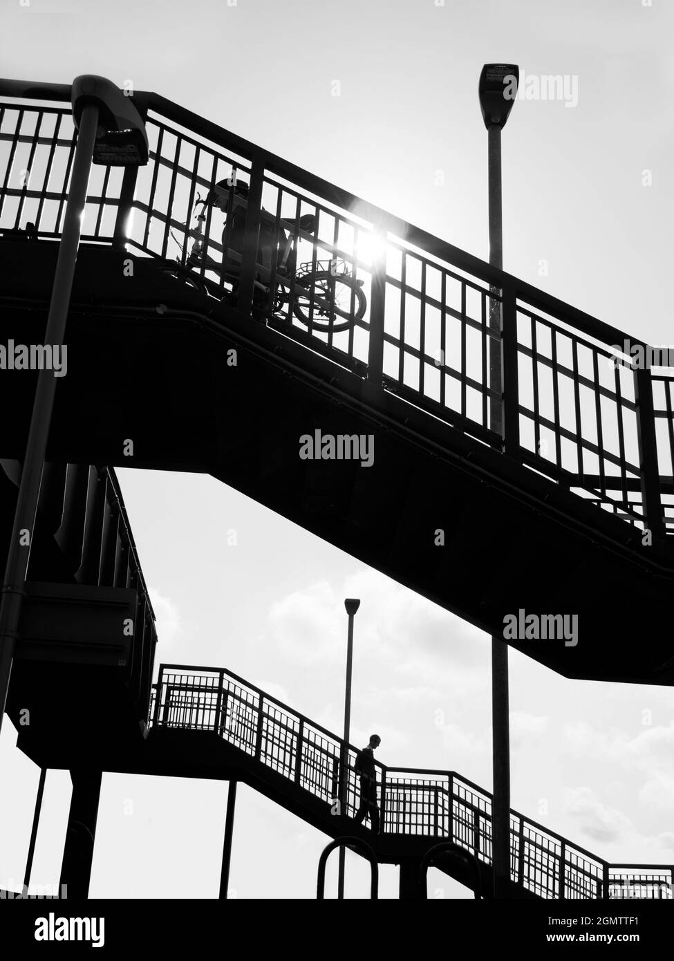 Radley Village, Oxfordshire, England - 1 July 2019; one man ascending ...