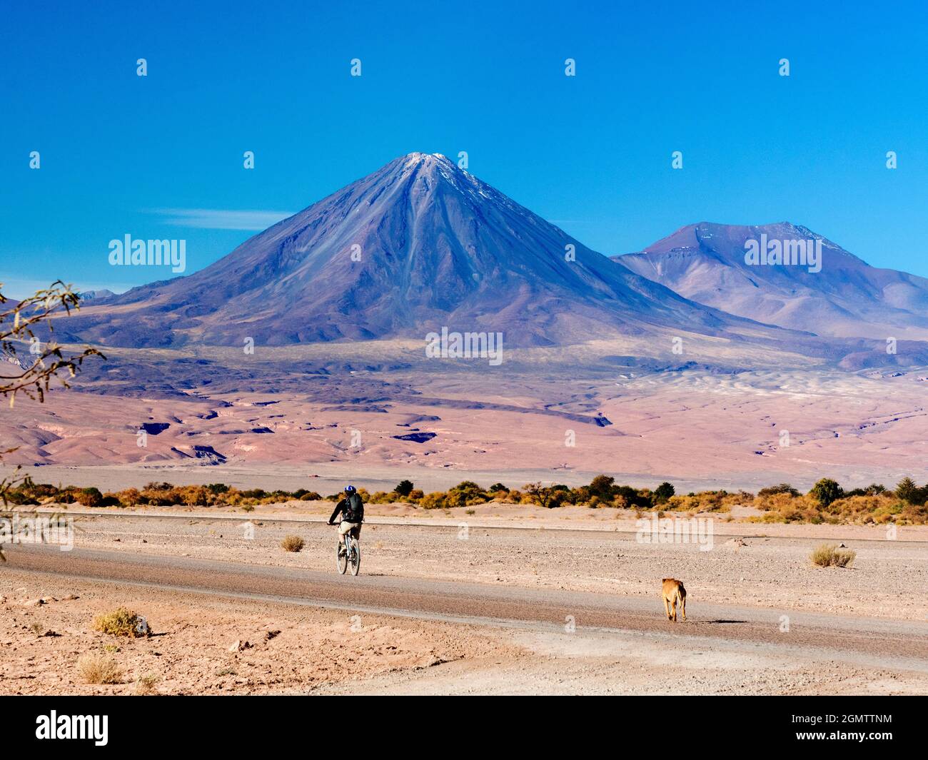 Valley of the Moon, Chile - 26 May 2018; one person on a bike The spectacular El Valle de la ...