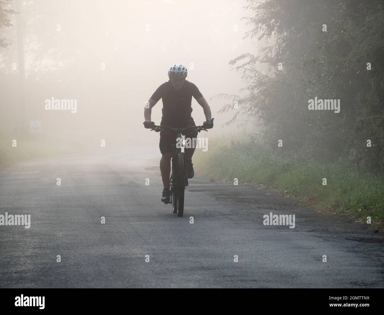 Radley Village, Oxfordshire, England - 14 August 2020; one person, bike ...