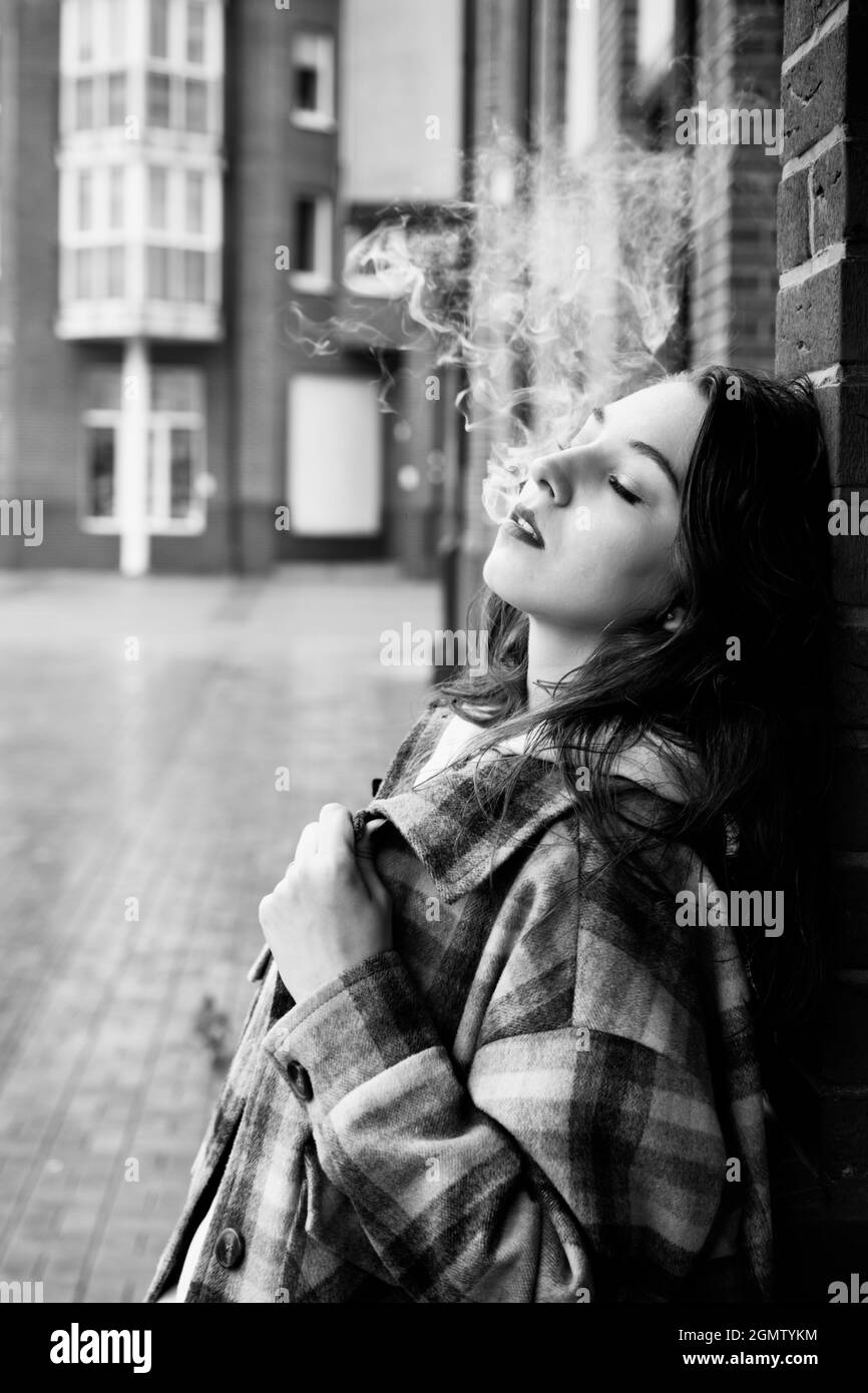 Female Smoking Joint Black and White Stock Photos & Images - Alamy