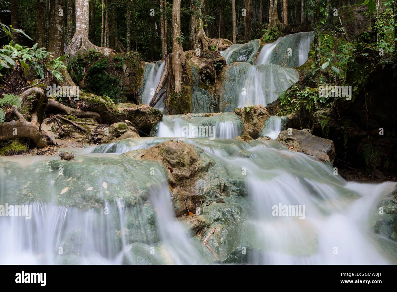 The 7 level Oehala waterfall near the small city Soe (So'É), West Timor ...