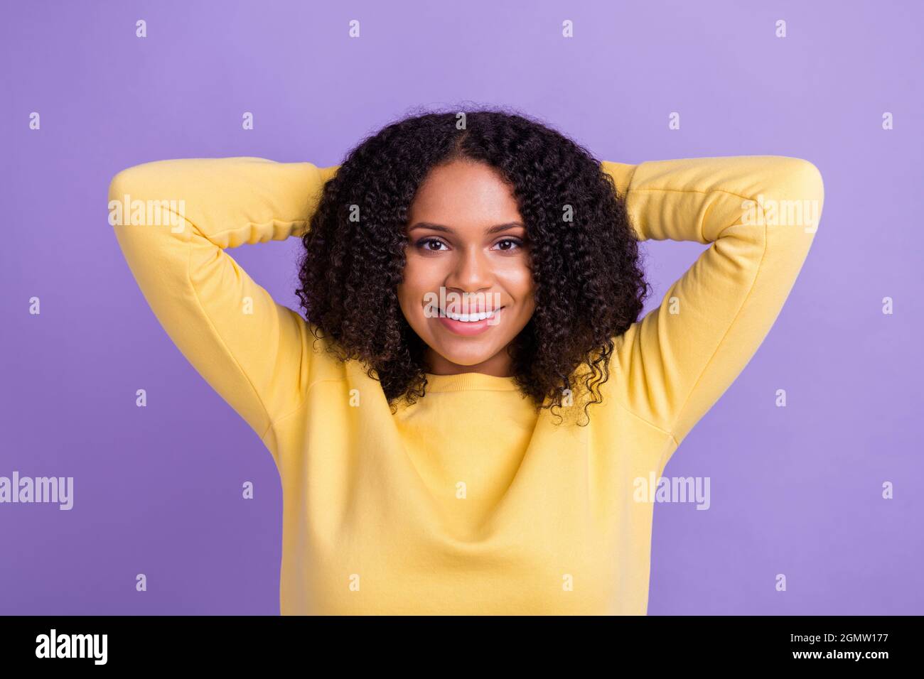 Photo of charming cute dark skin woman wear yellow sweater smiling arms ...