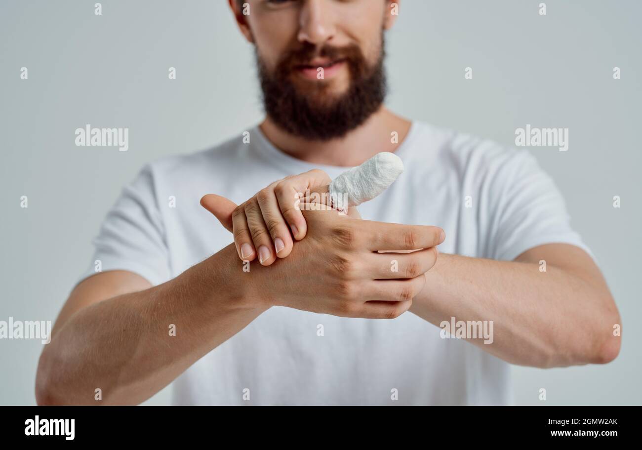 sick man hand injury treatment health problems light background Stock ...
