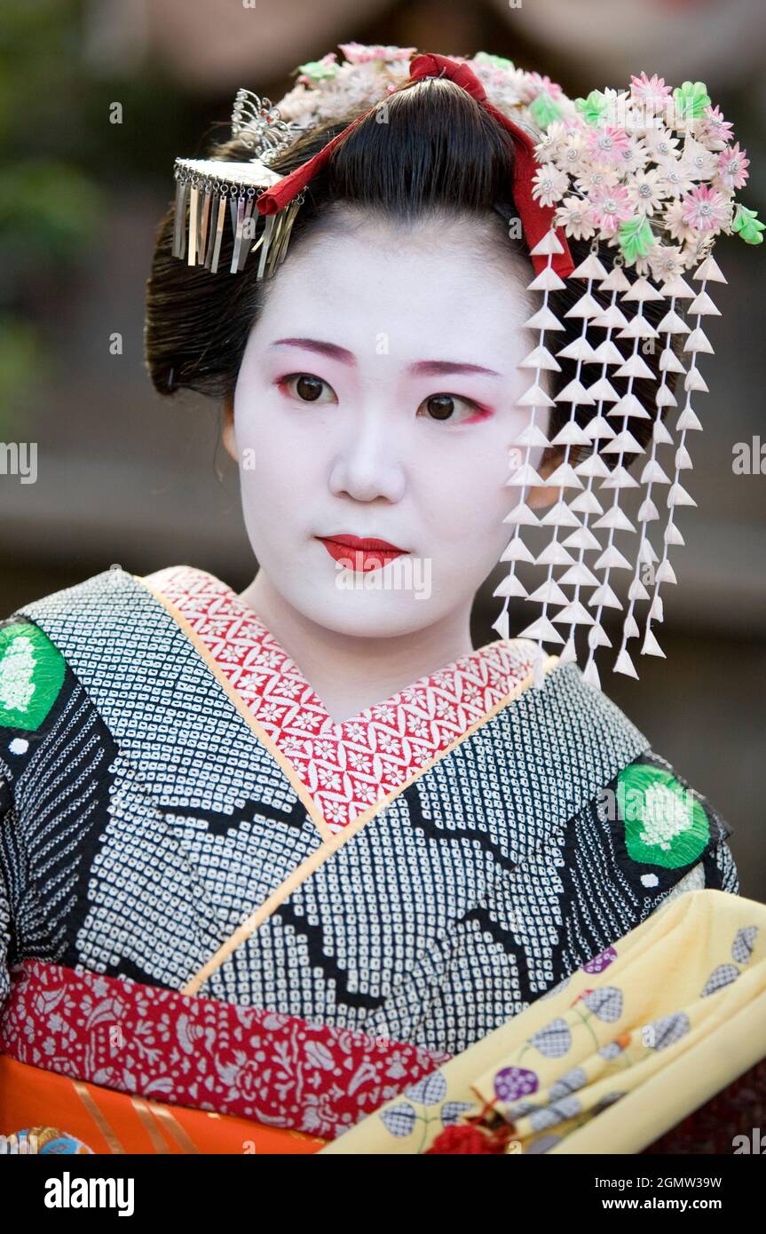 Kyoto, Japan - 2 November 2005; one women posing in-shot. The geisha ...