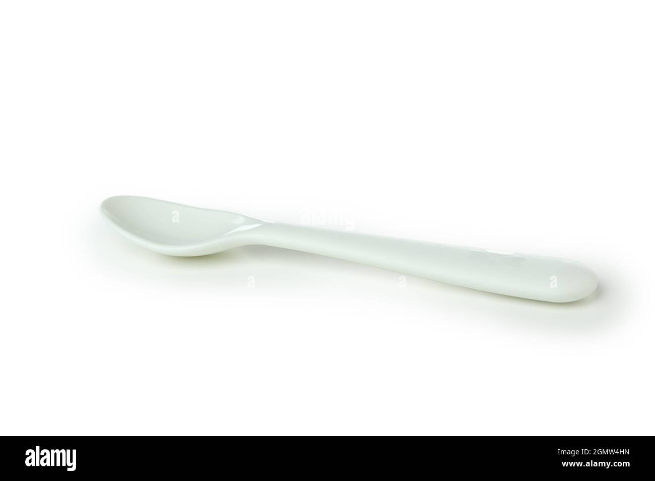 Single plastic spoon isolated on white background Stock Photo - Alamy