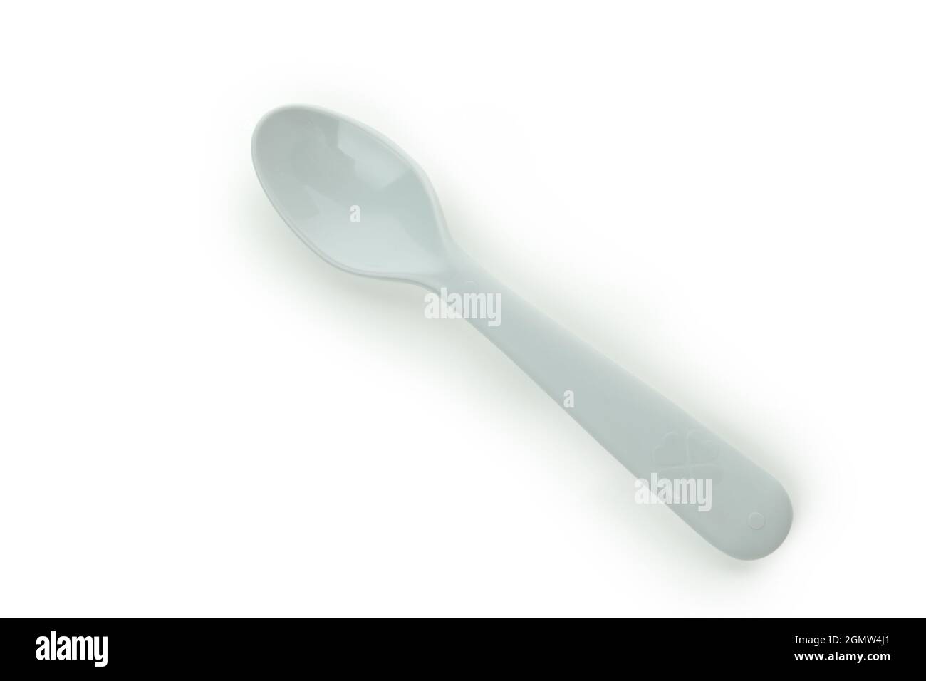 Single plastic spoon isolated on white background Stock Photo - Alamy