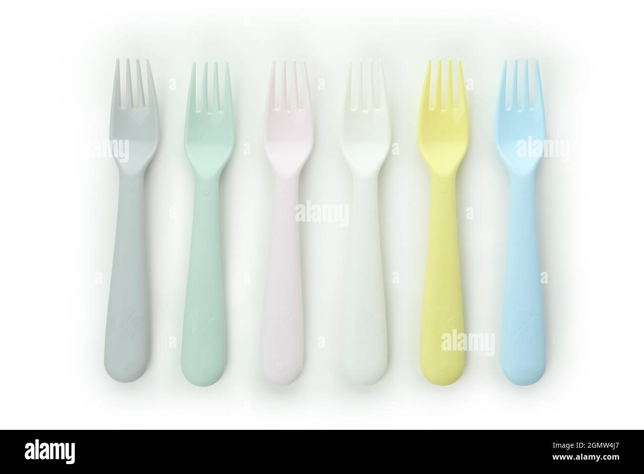Colorful plastic forks isolated on white background Stock Photo - Alamy