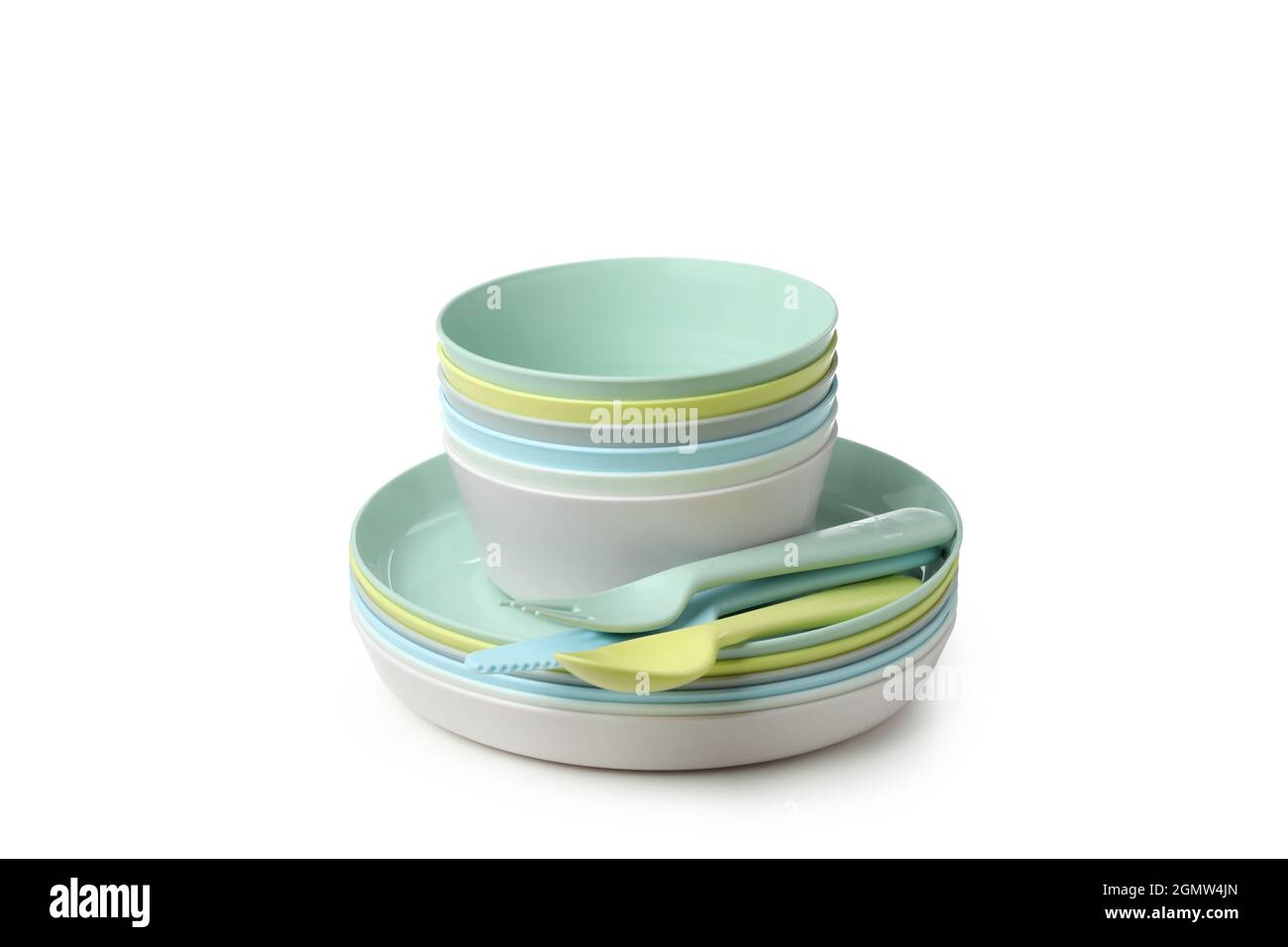 Colorful plastic dishware isolated on white background Stock Photo - Alamy