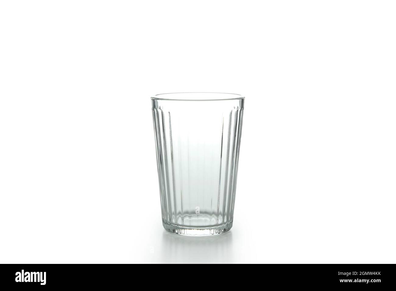 Single empty glass isolated on white background Stock Photo - Alamy