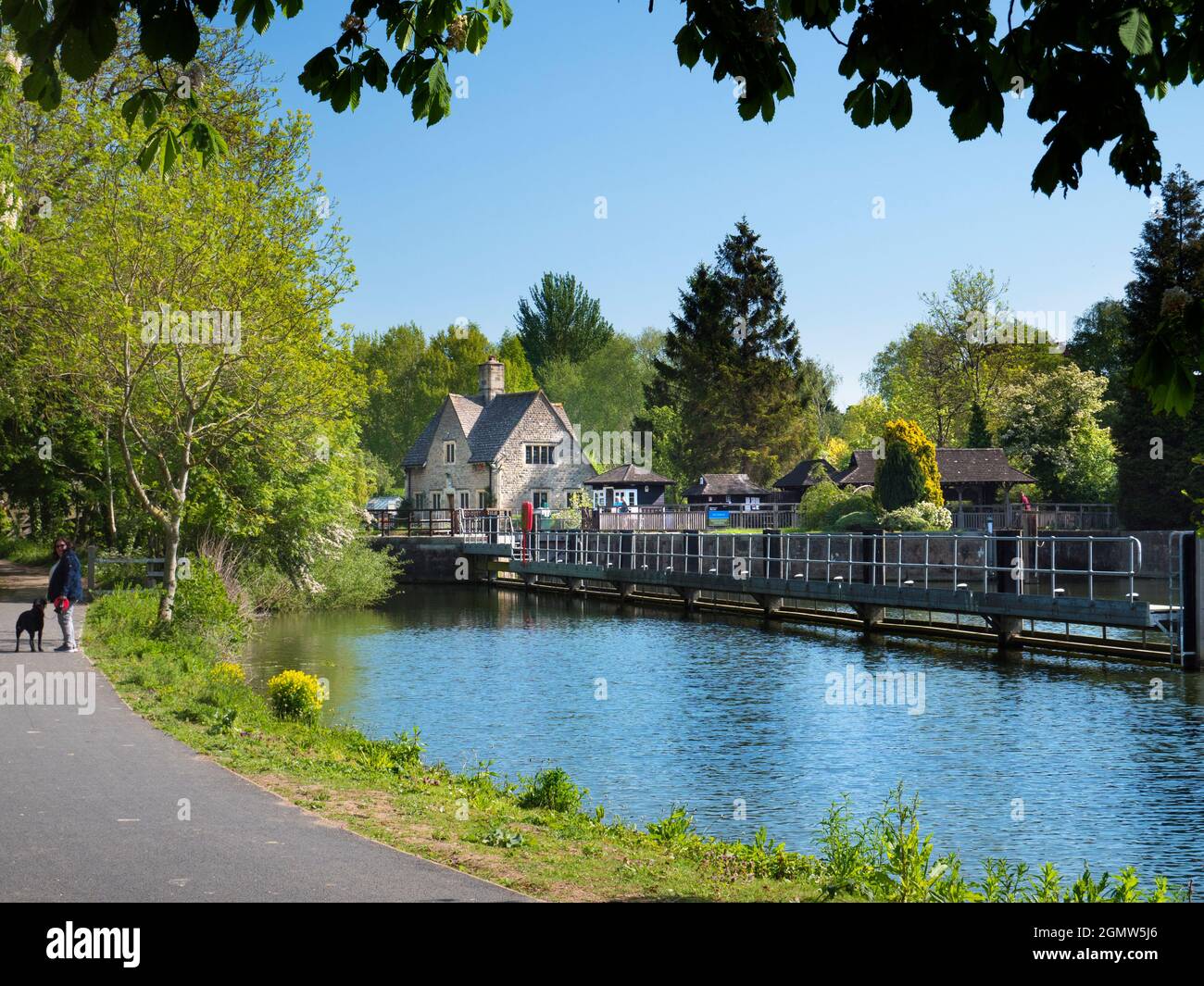 Iffley, Oxfordshire - England - May 2019; one woman in shot. The Thames ...