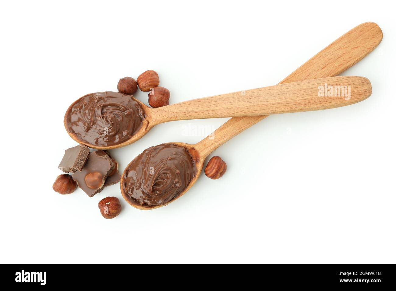 Spoons with chocolate paste and nuts isolated on white background Stock ...