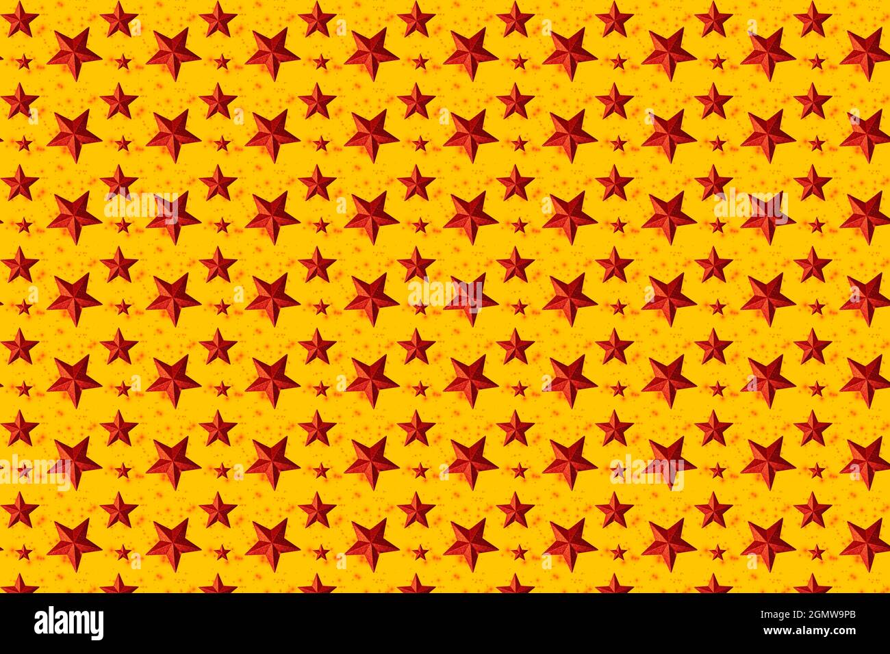 texture or repetitive Christmas pattern background with red stars of ...