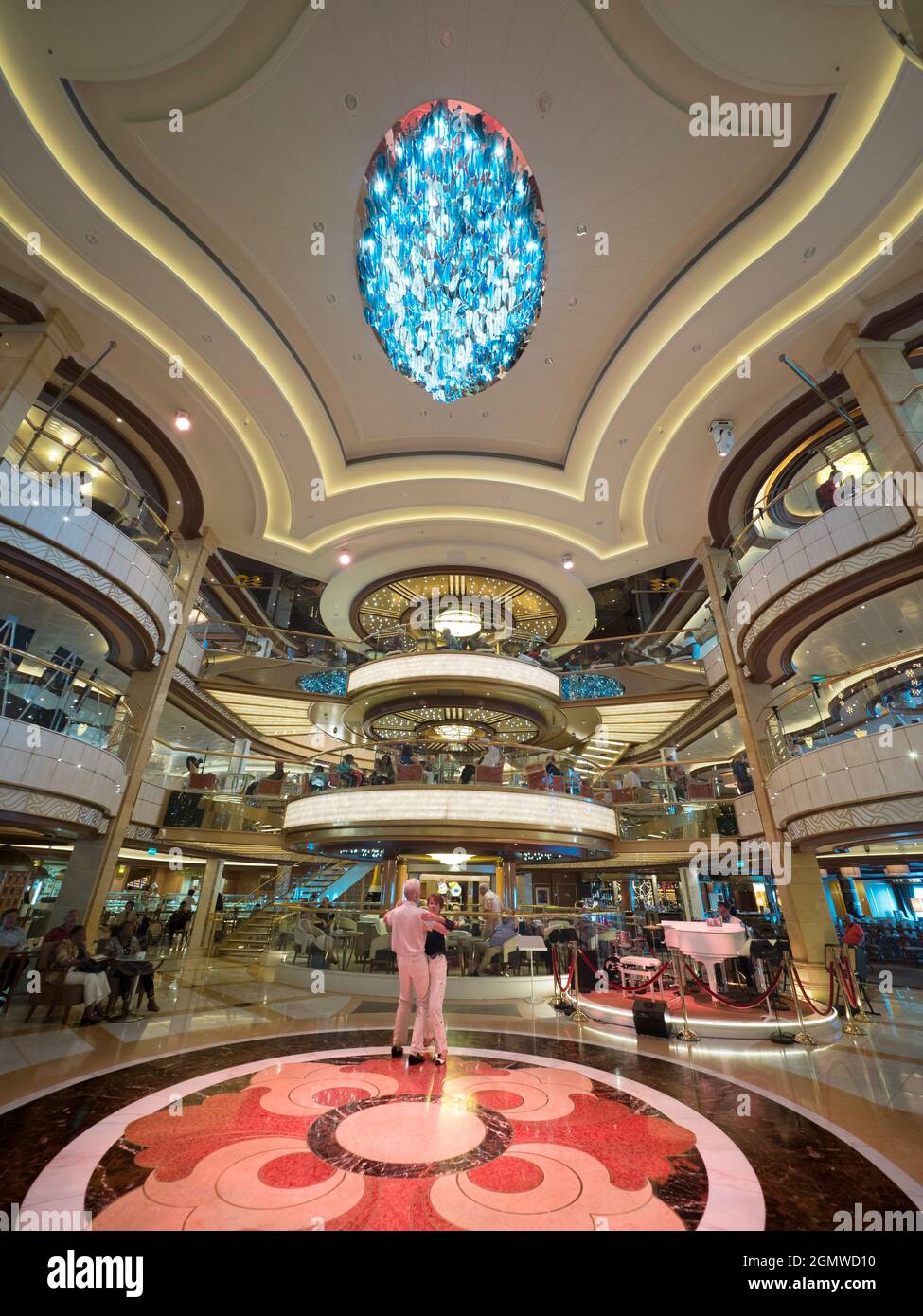 At Sea , Mary 2018, cruising the Pacific. The glitzy atrium of a luxury ...
