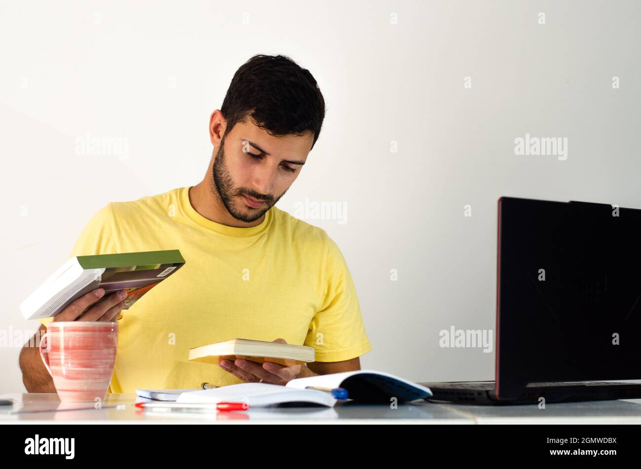 Black man studying in library hi-res stock photography and images - Alamy