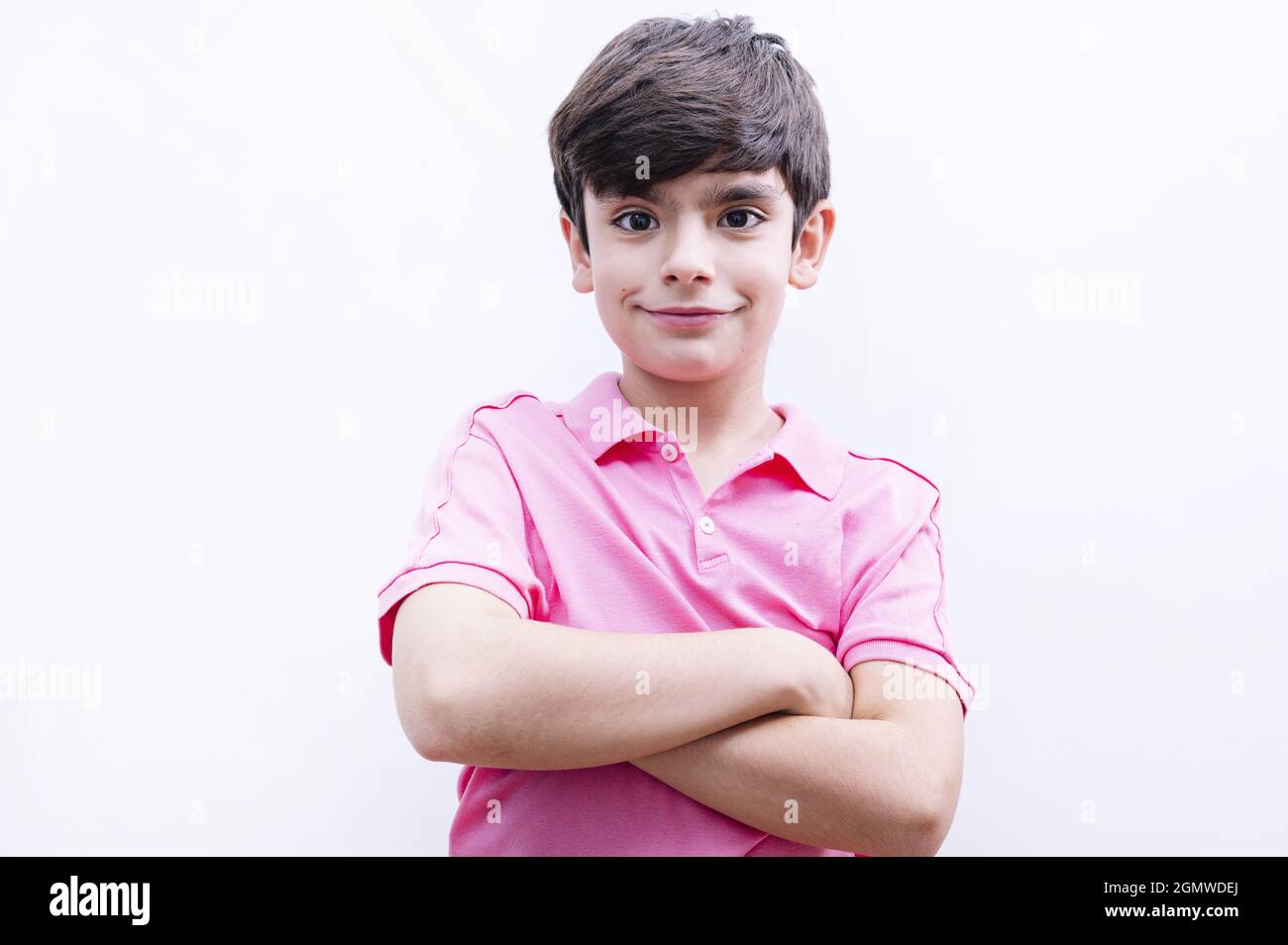 Caucasian teenage boy with his arms crossed Stock Photo - Alamy