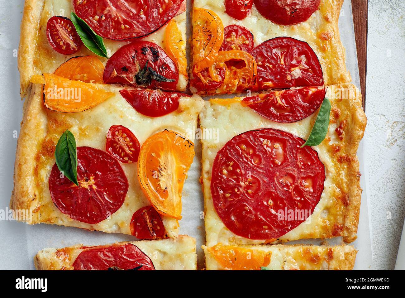 Delicious homemade square pizza with vegetables on white Stock Photo ...