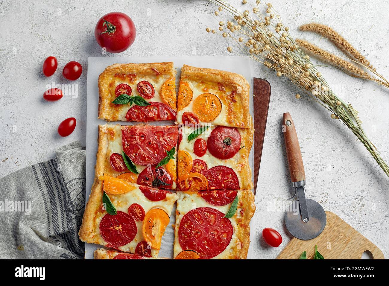 Delicious homemade square pizza with vegetables on white Stock Photo ...