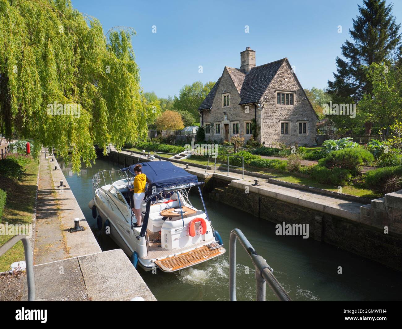 Iffley, Oxfordshire - England - May 2019; one woman in shot. The Thames ...