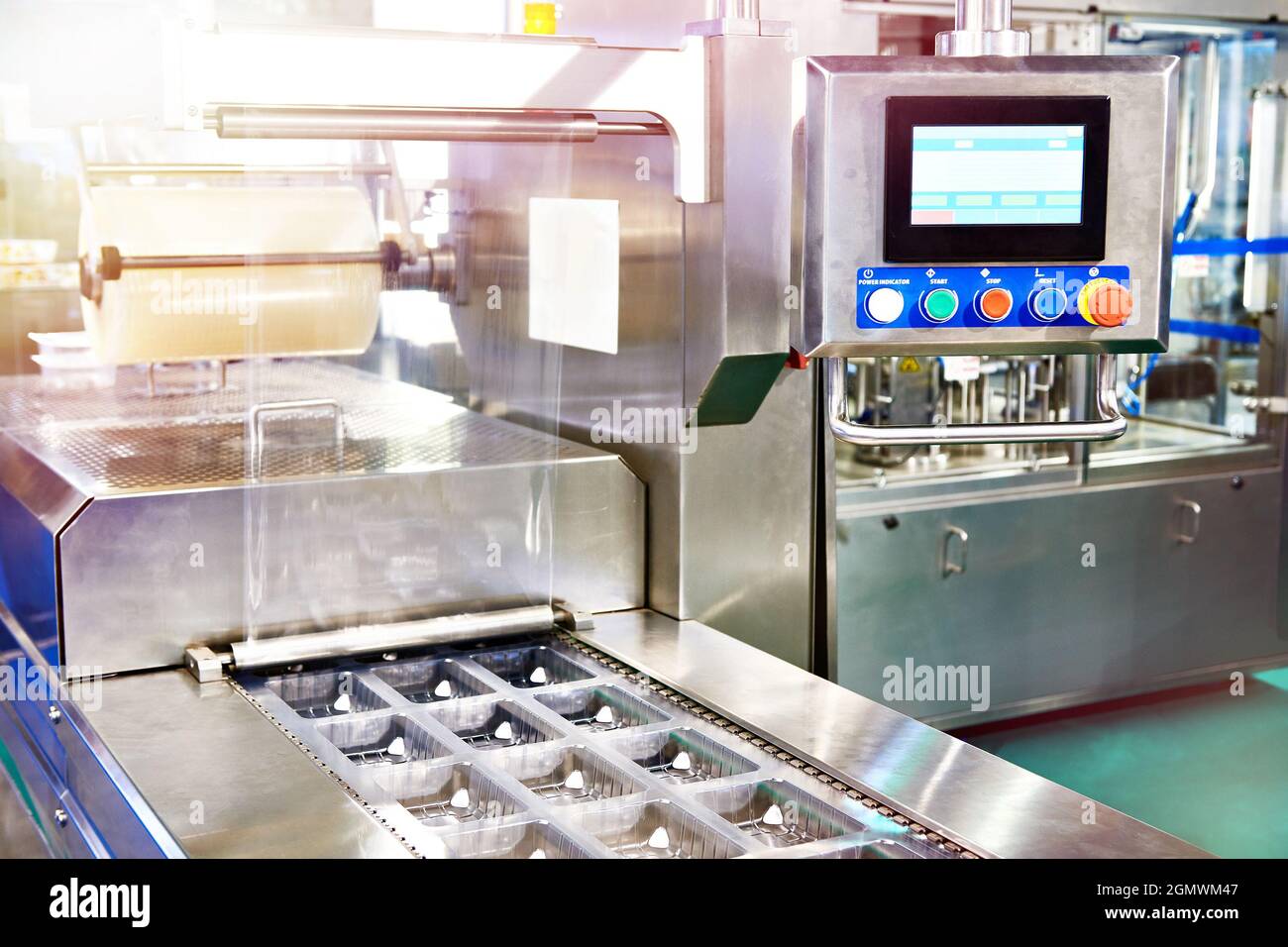 Plastic wrapping machine hi-res stock photography and images - Alamy