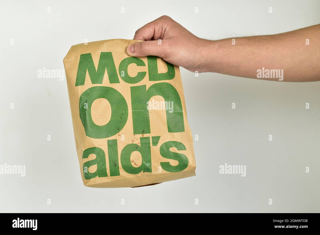 New Delhi, India - Feb 3, 2021: McDonald's food paper bag in hand on ...