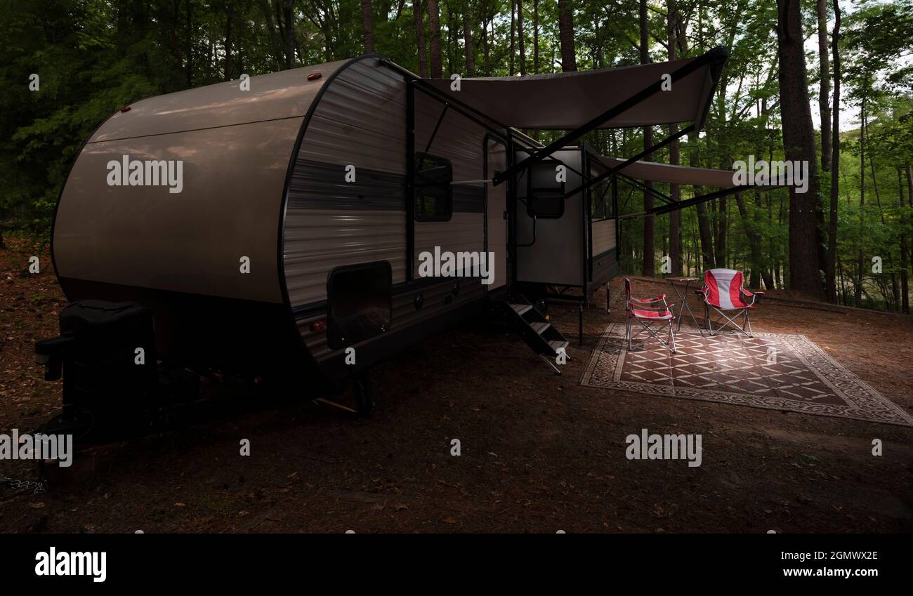 Campter trailer campsite as night is falling near Jordan Lake in North ...